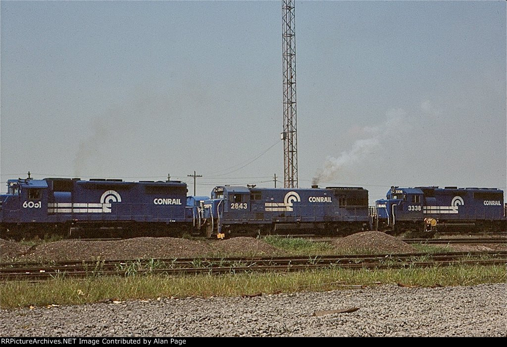 CR SD35 6051 (ex-CNJ 2512) and U30B 2843 smoke it up